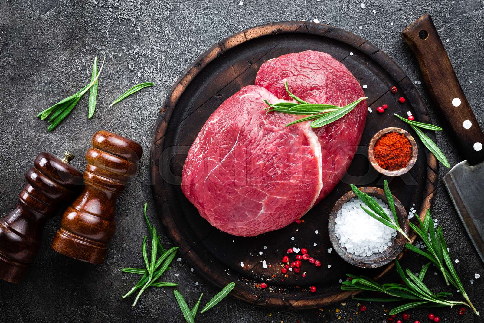 Raw beef meat. Fresh cut of beef meat on board with spices | Stock ...