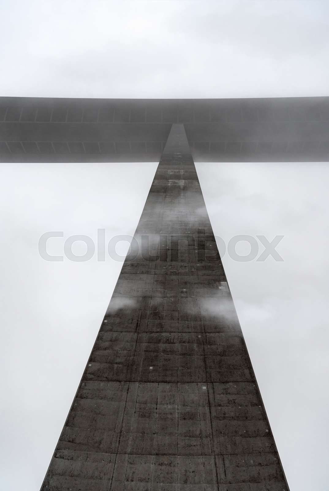Pillar of a tall bridge viewed from beneath | Stock image | Colourbox