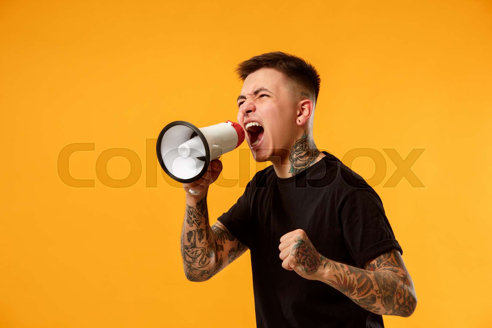 man making announcement with megaphone | Stock image | Colourbox