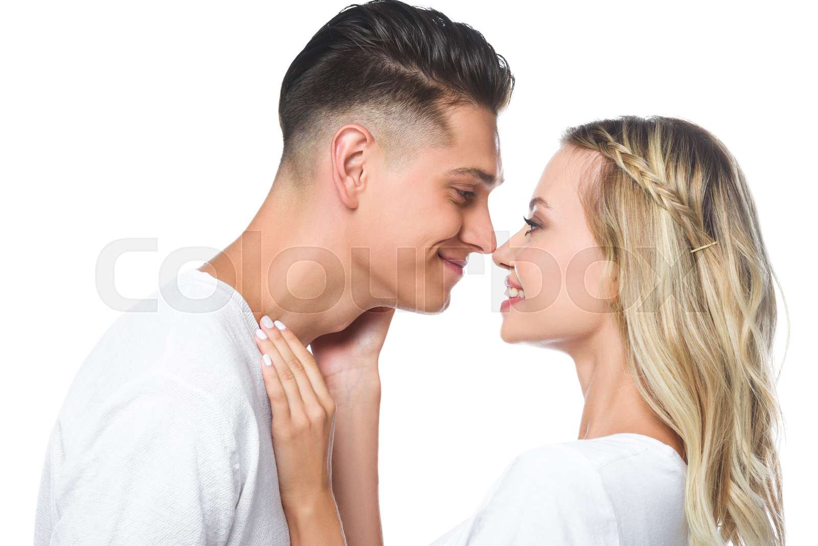 side view of happy couple going to kiss isolated on white | Stock image ...