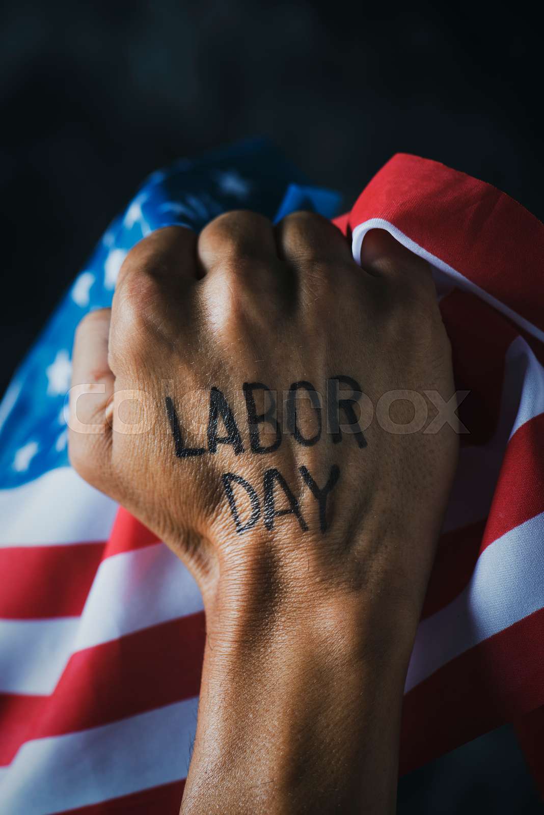 raised fist, american flag and text labor day | Stock image | Colourbox