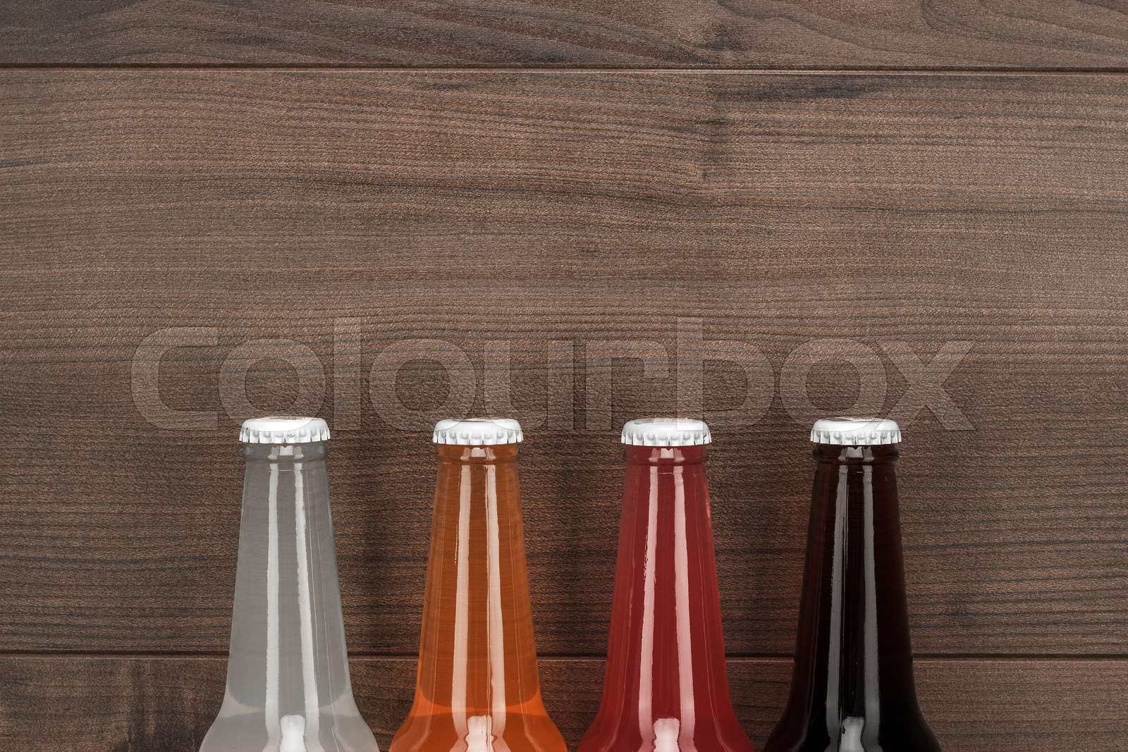 glass bottles of different sweet drinks | Stock image | Colourbox