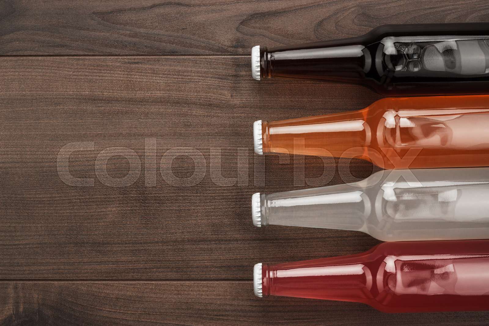 glass bottles of different sweet drinks | Stock image | Colourbox