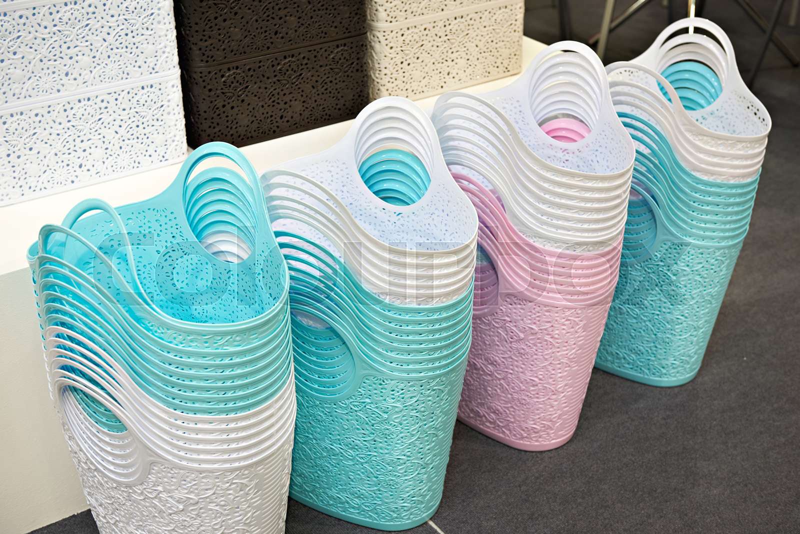 Plastic laundry baskets in store | Stock image | Colourbox