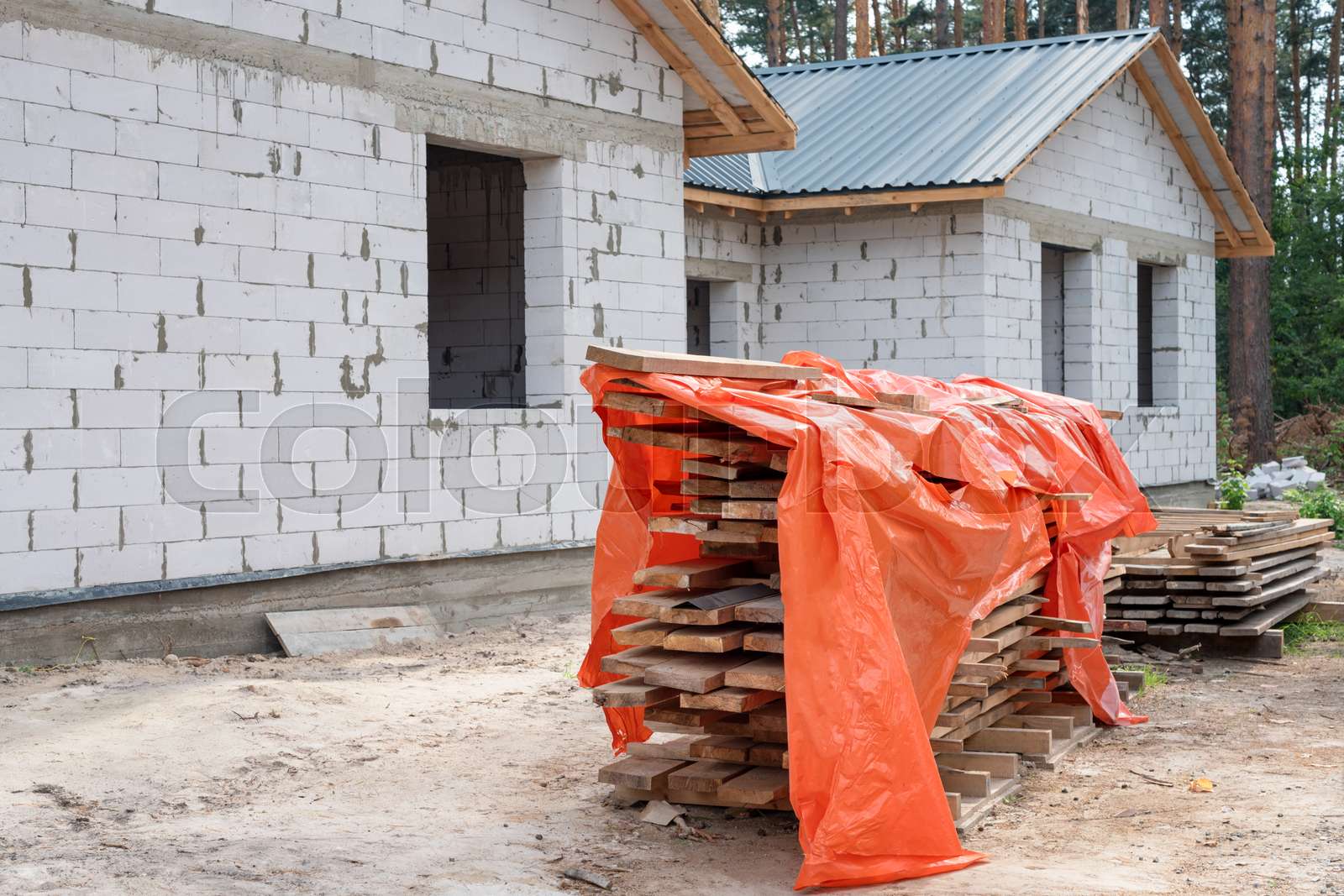 Building a house. Unfinished brick house in progress. | Stock image ...