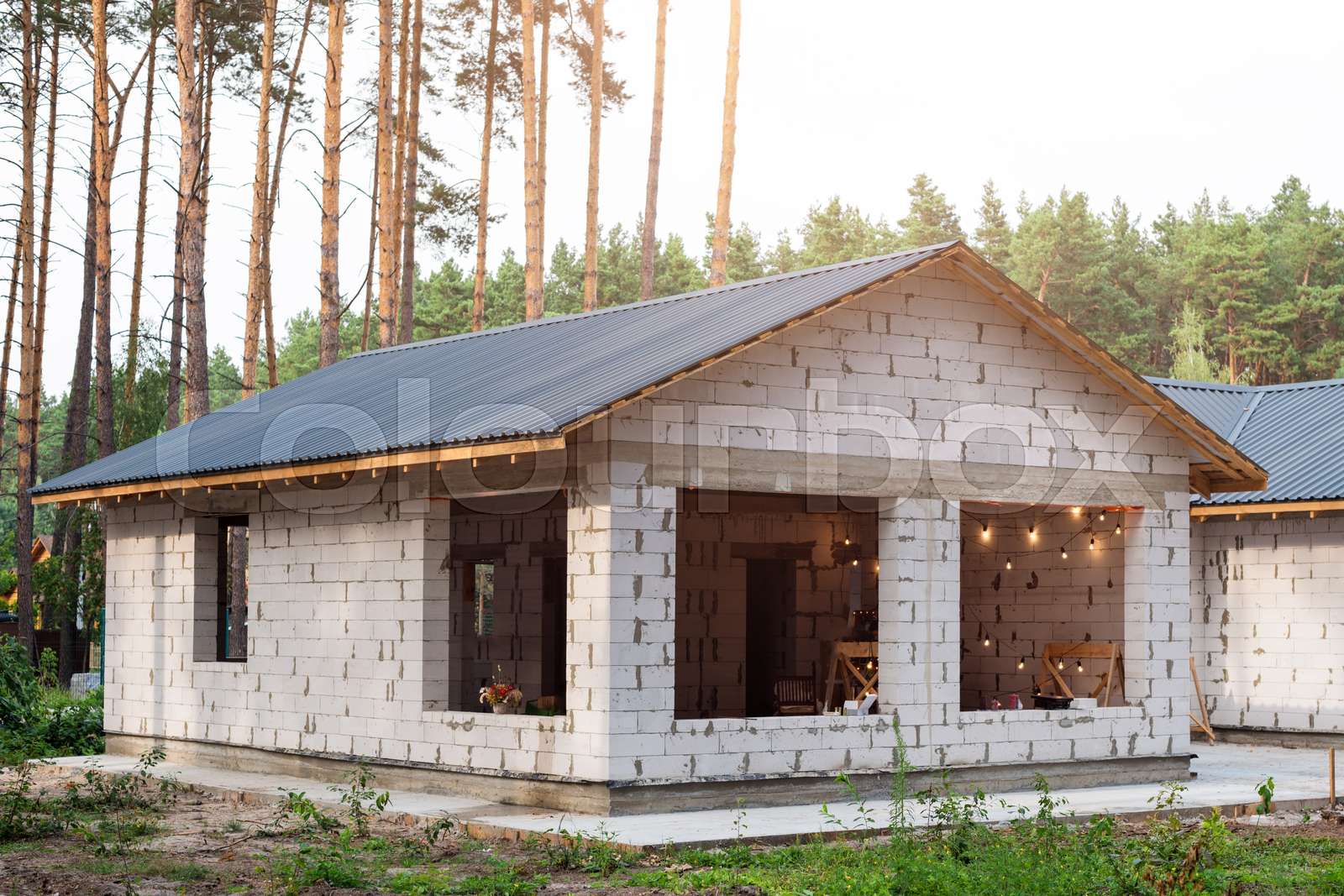 Building a house. Unfinished brick house in progress. | Stock image ...