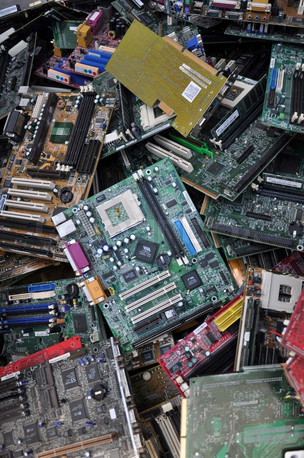 dump yard full of old damaged electronic components | Stock image ...