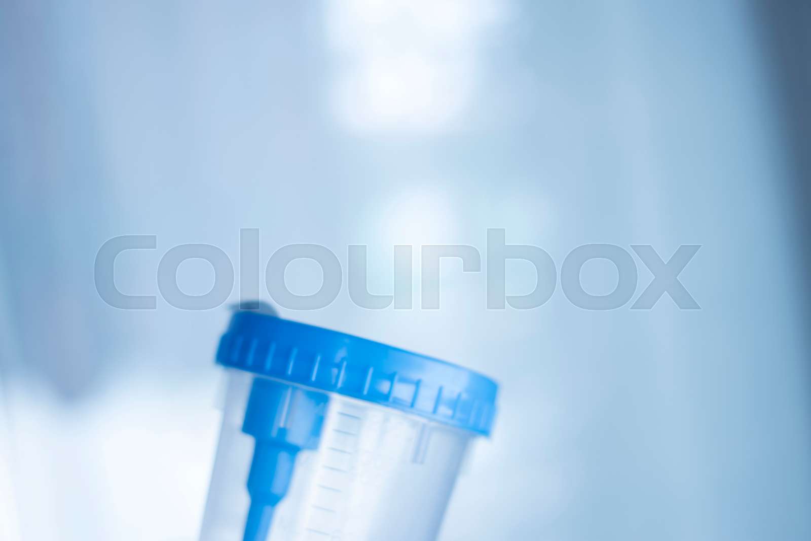 Urine sample test cup | Stock image | Colourbox