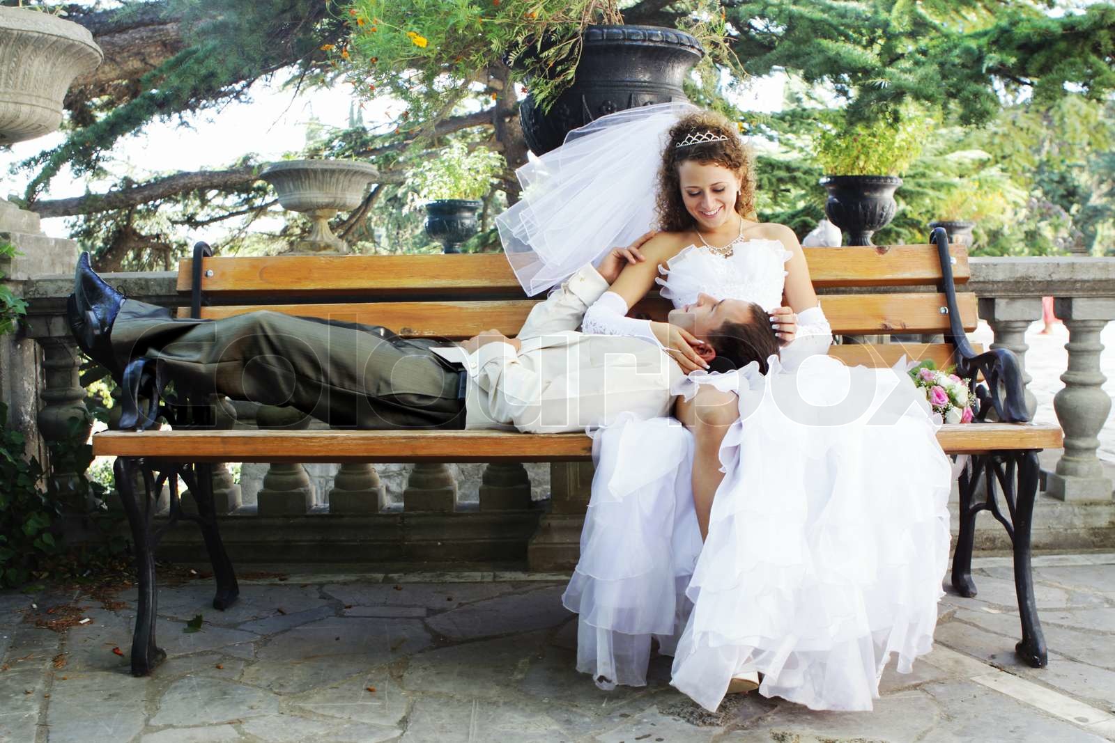 bride and groom on the bench | Stock image | Colourbox