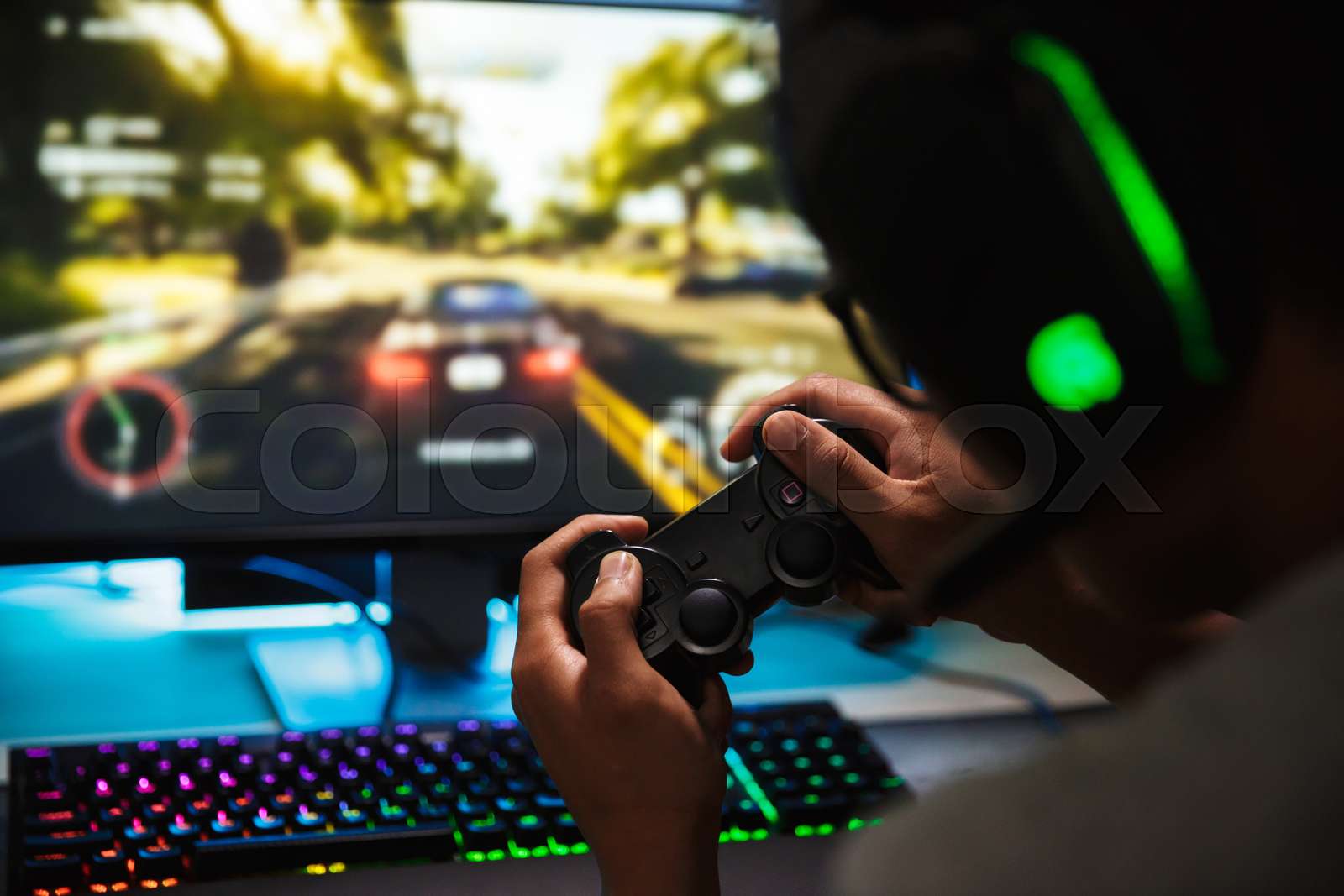 Photo closeup of teenage gamer guy playing video games online on ...
