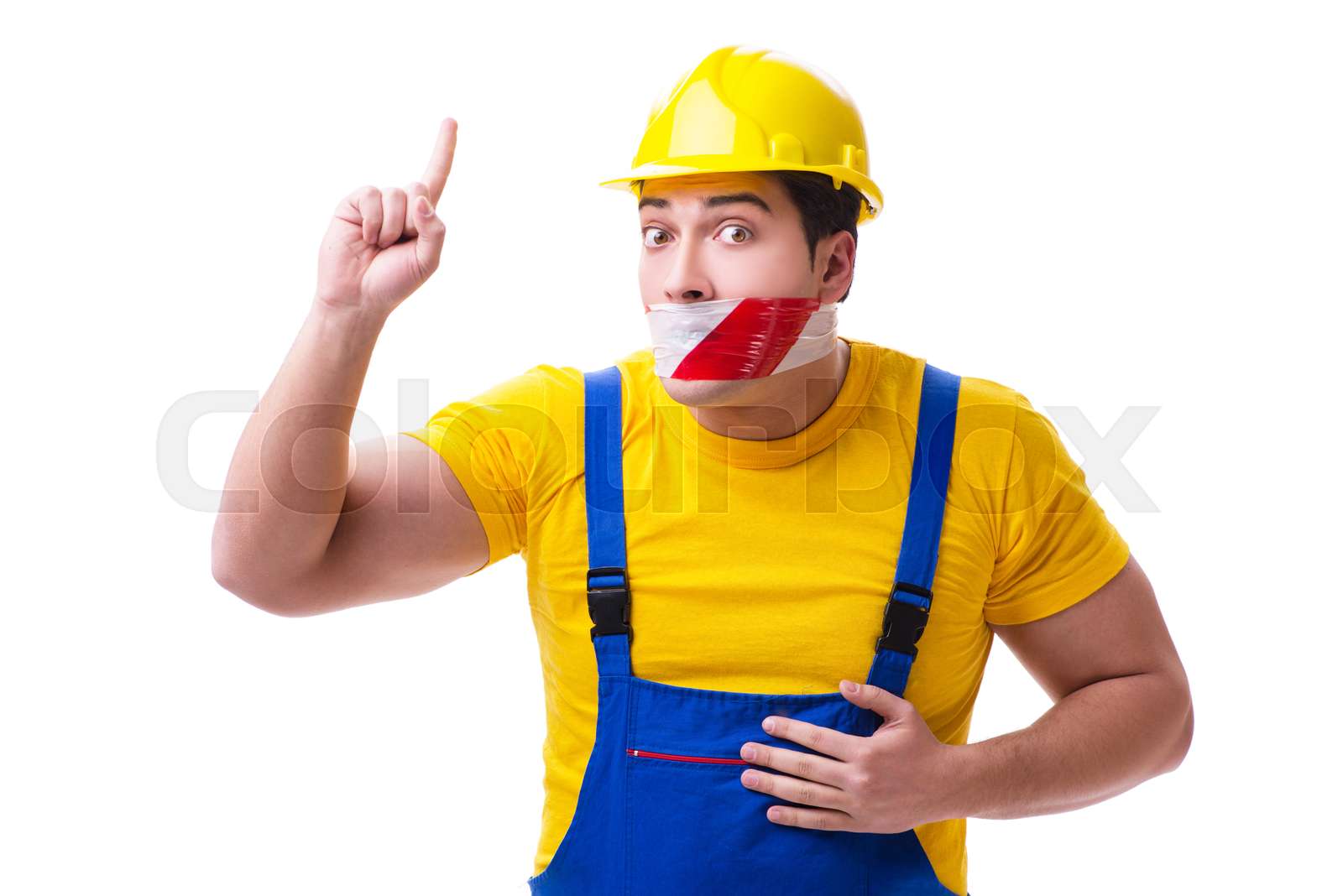 Funny worker wearing coveralls with tape | Stock image | Colourbox