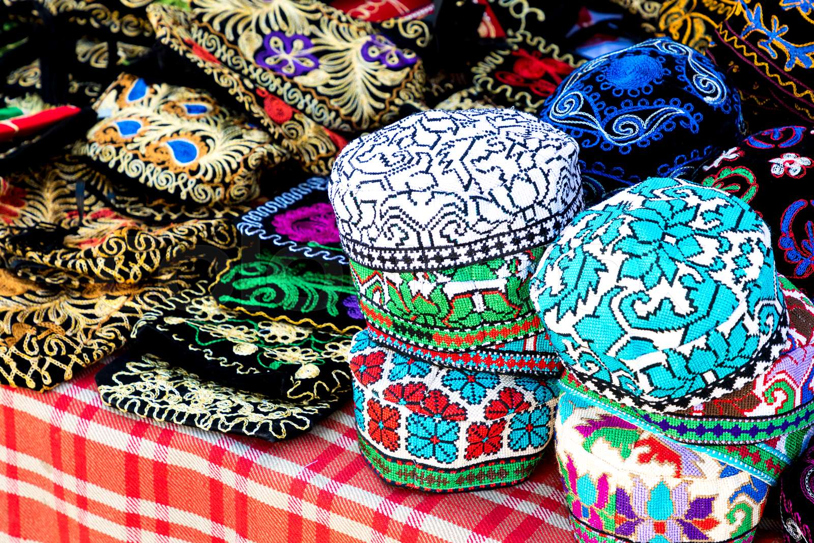 The traditional Uzbek cap named tubeteika, decorated with multi colored ...