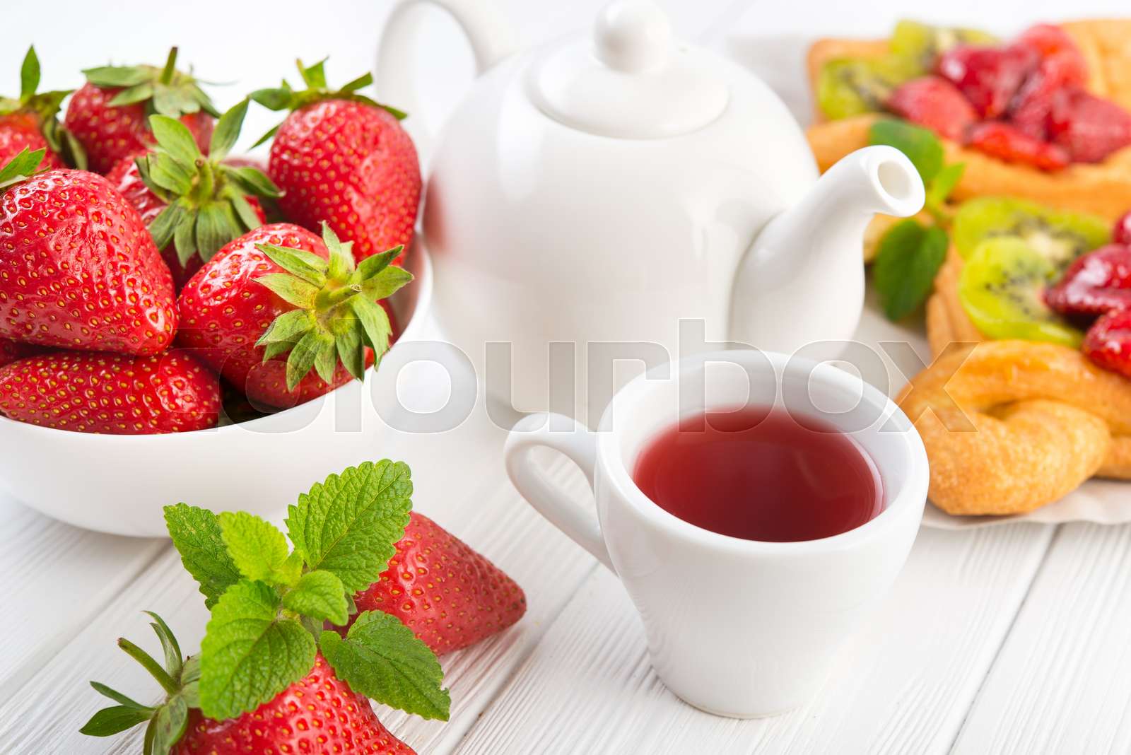 Fruit tea and sweet bakery with strawberry | Stock image | Colourbox