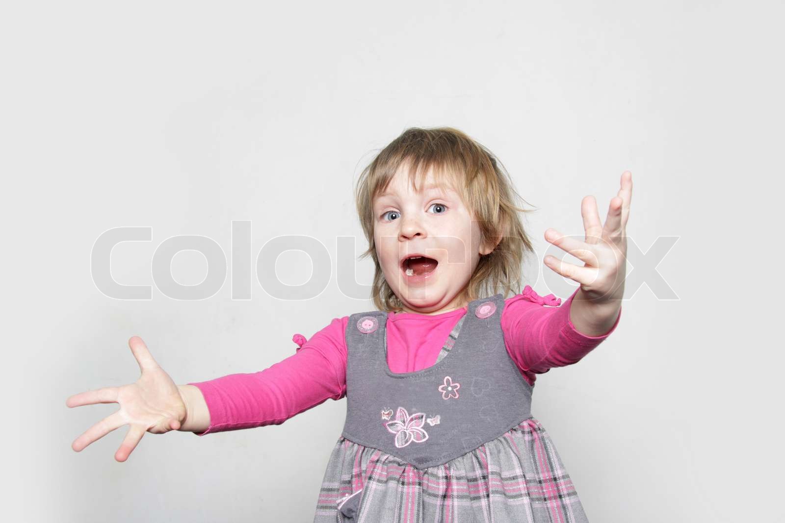 studio shot of young girl shouting | Stock image | Colourbox