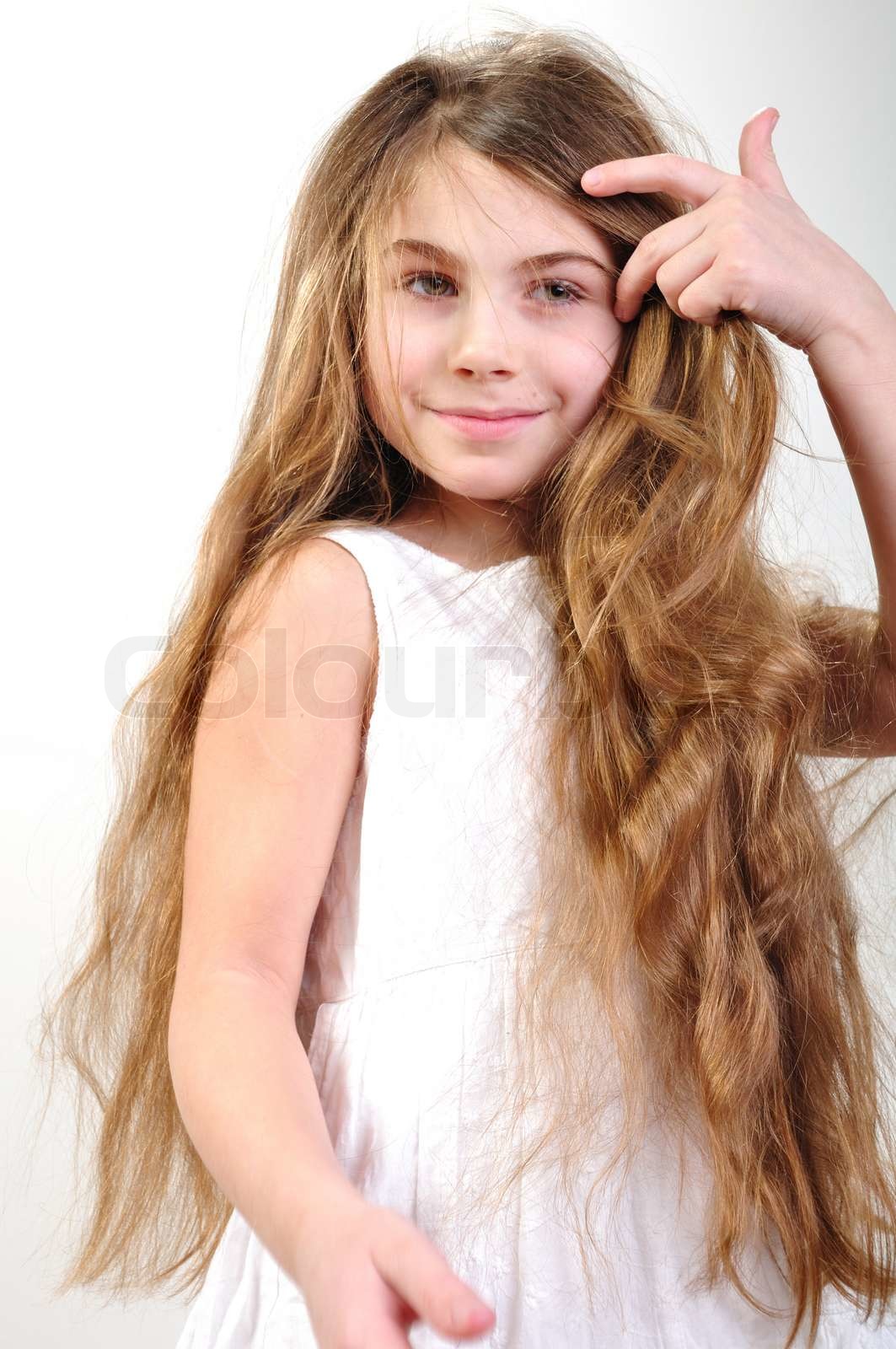 Kind mit langen Haaren | Stock Bild | Colourbox