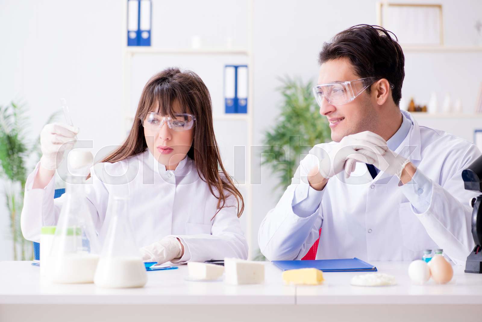 Two lab doctor testing food products | Stock image | Colourbox