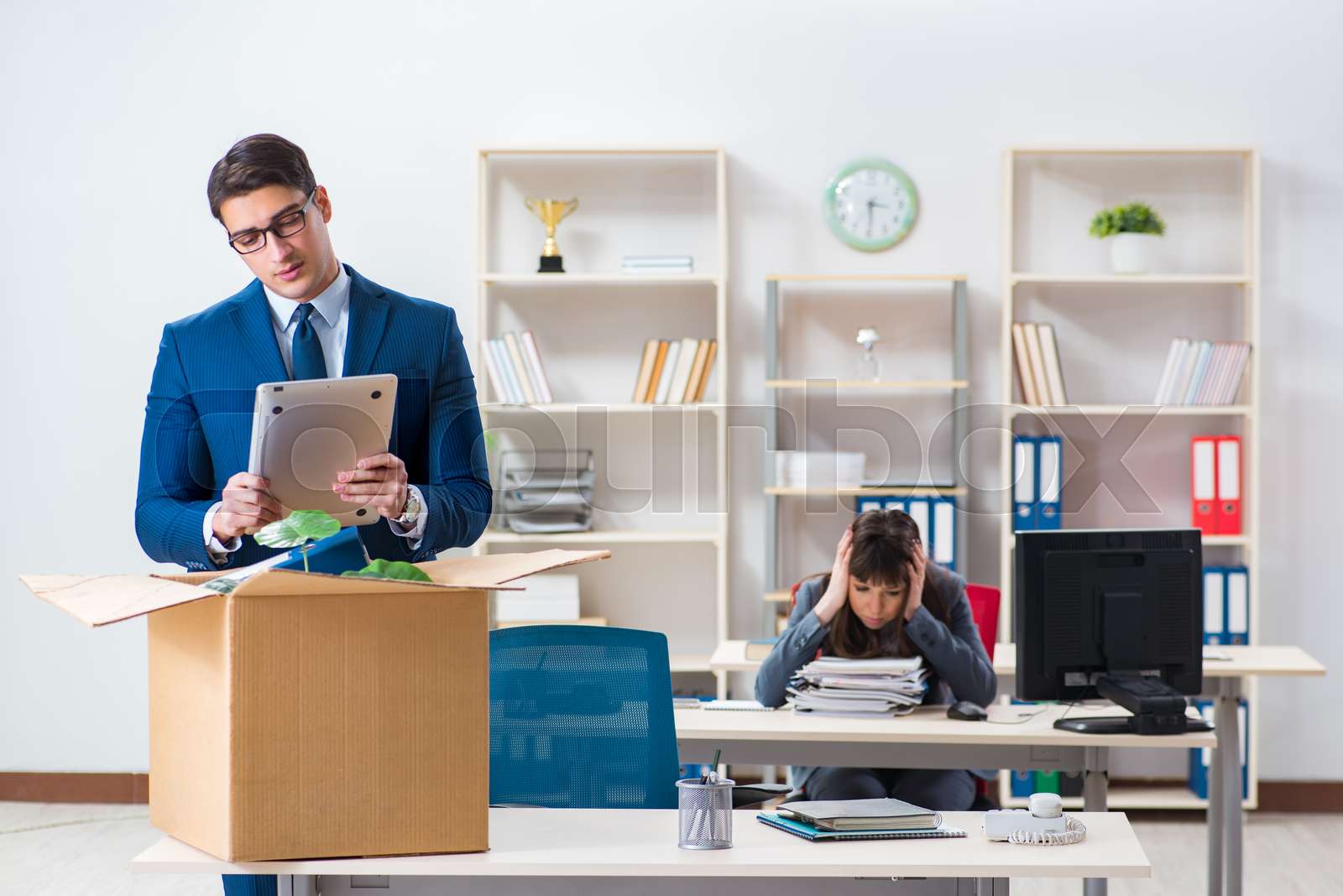 Person being fired from his work | Stock image | Colourbox
