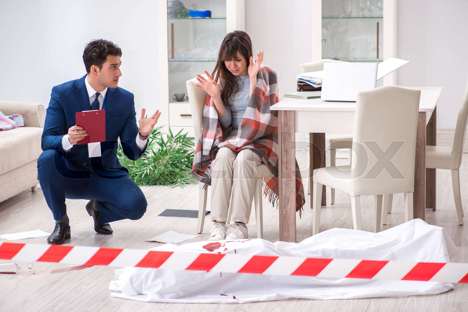 Victim wife at the scene on murder | Stock image | Colourbox