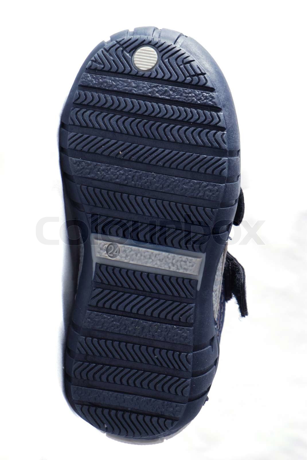 The structure of the soles on athletic shoes with grooves and rims ...