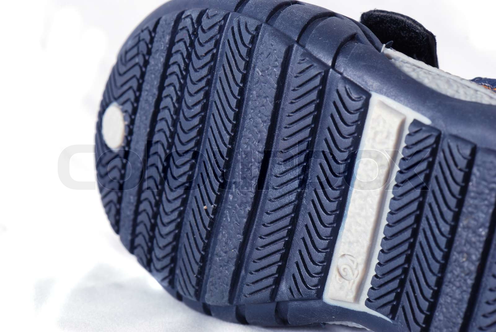 The structure of the soles on athletic shoes with grooves and rims ...