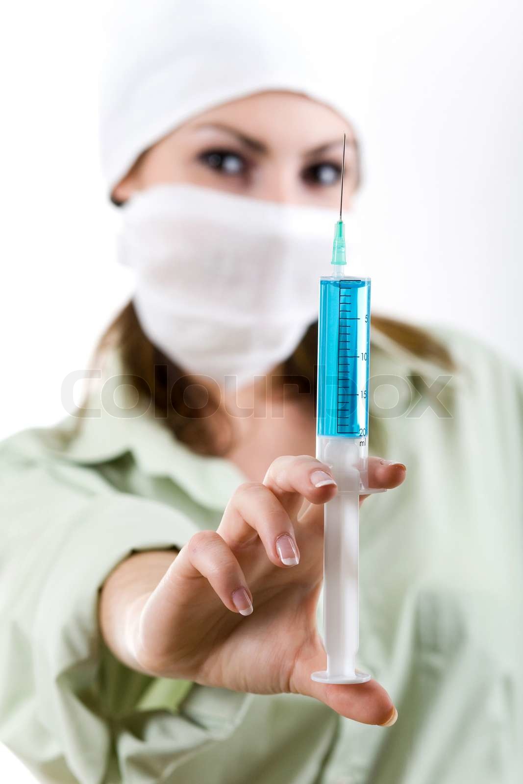 An image of medician with an injection | Stock image | Colourbox