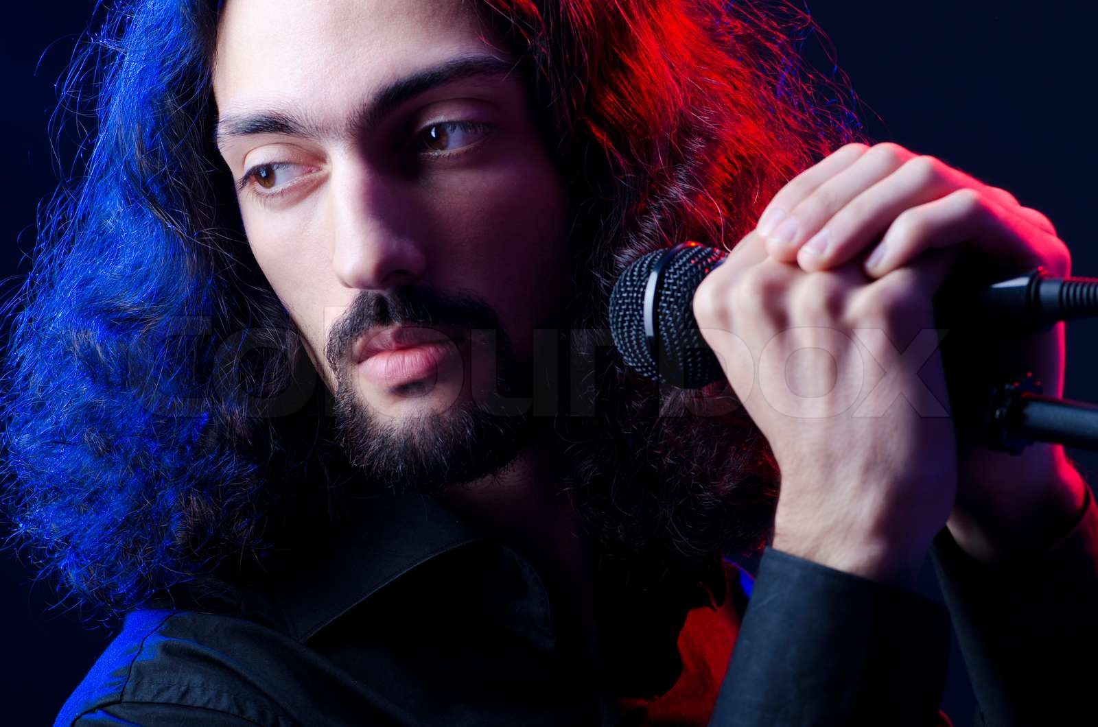 Man singing at the concert | Stock image | Colourbox