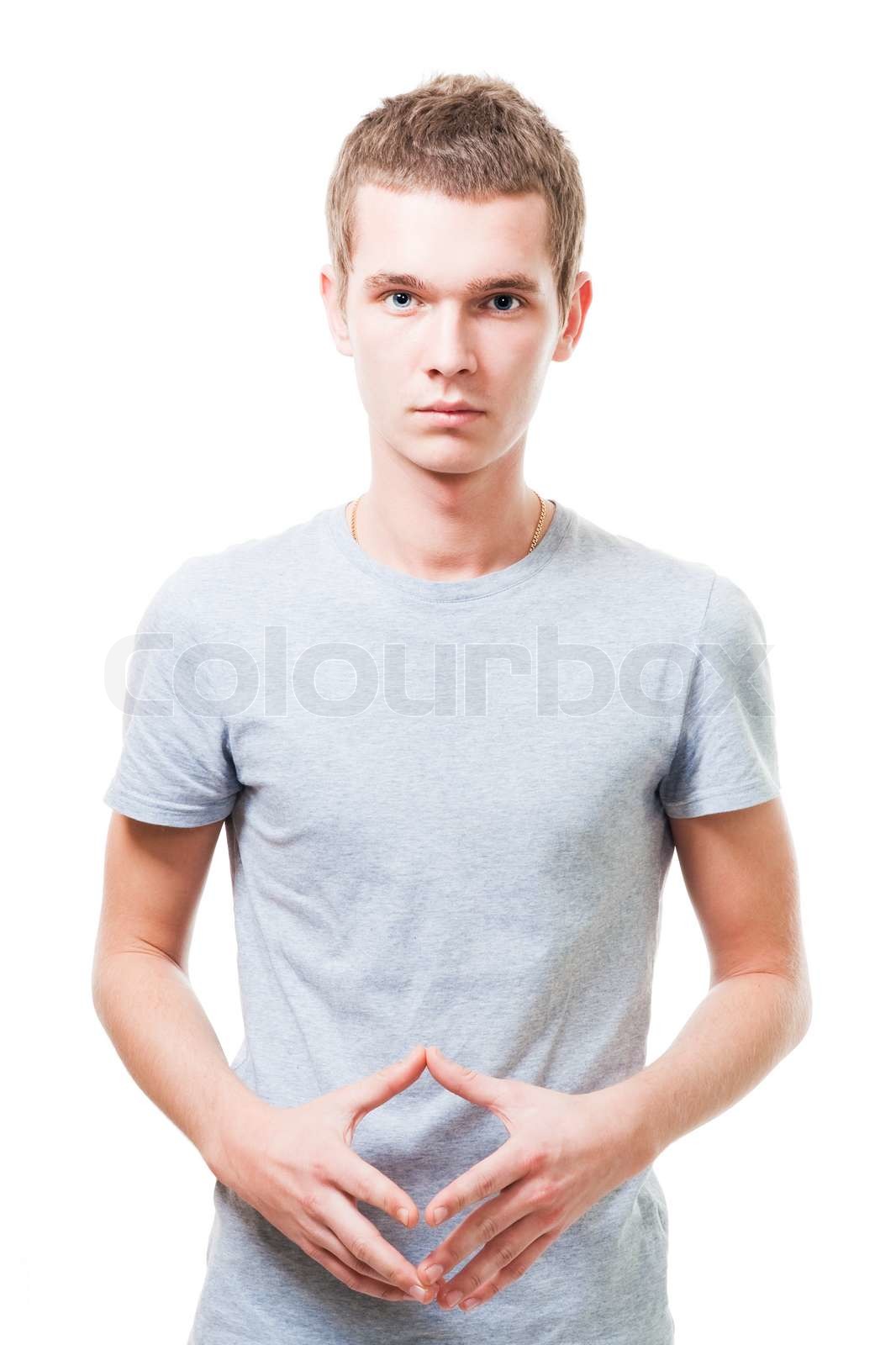 Portrait of thoughtful calm young man standing, isolated on white ...