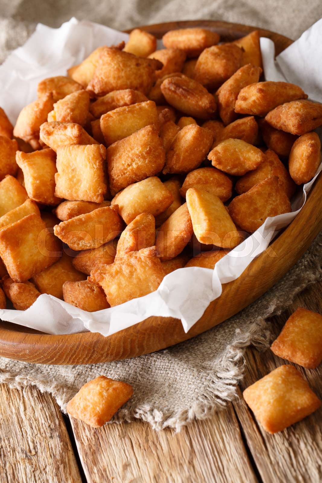 Delicious Nigerian appetizer Chin Chin fried dough close-up in a bowl ...