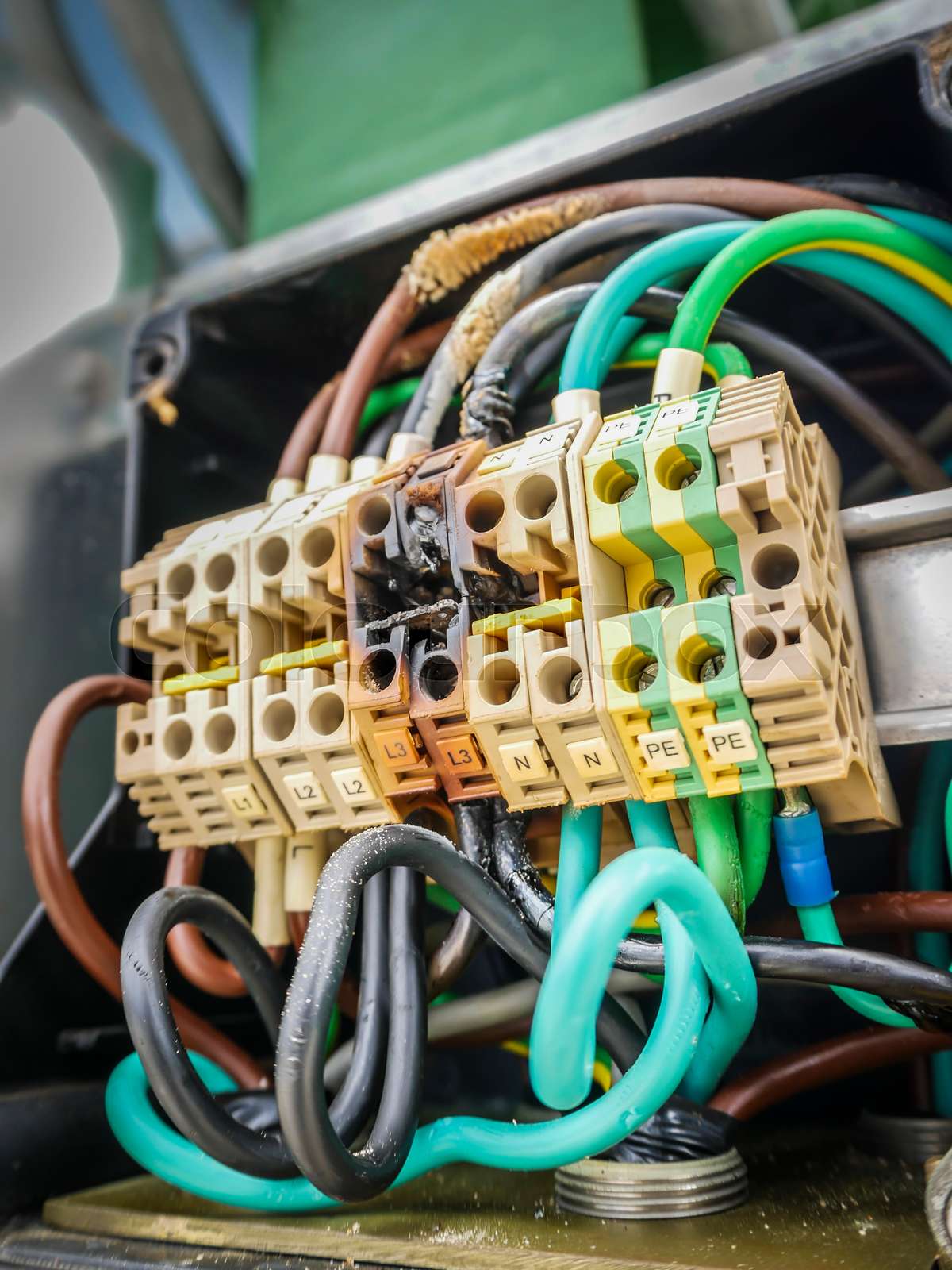 Electrical power cable and terminal short circuit | Stock image | Colourbox