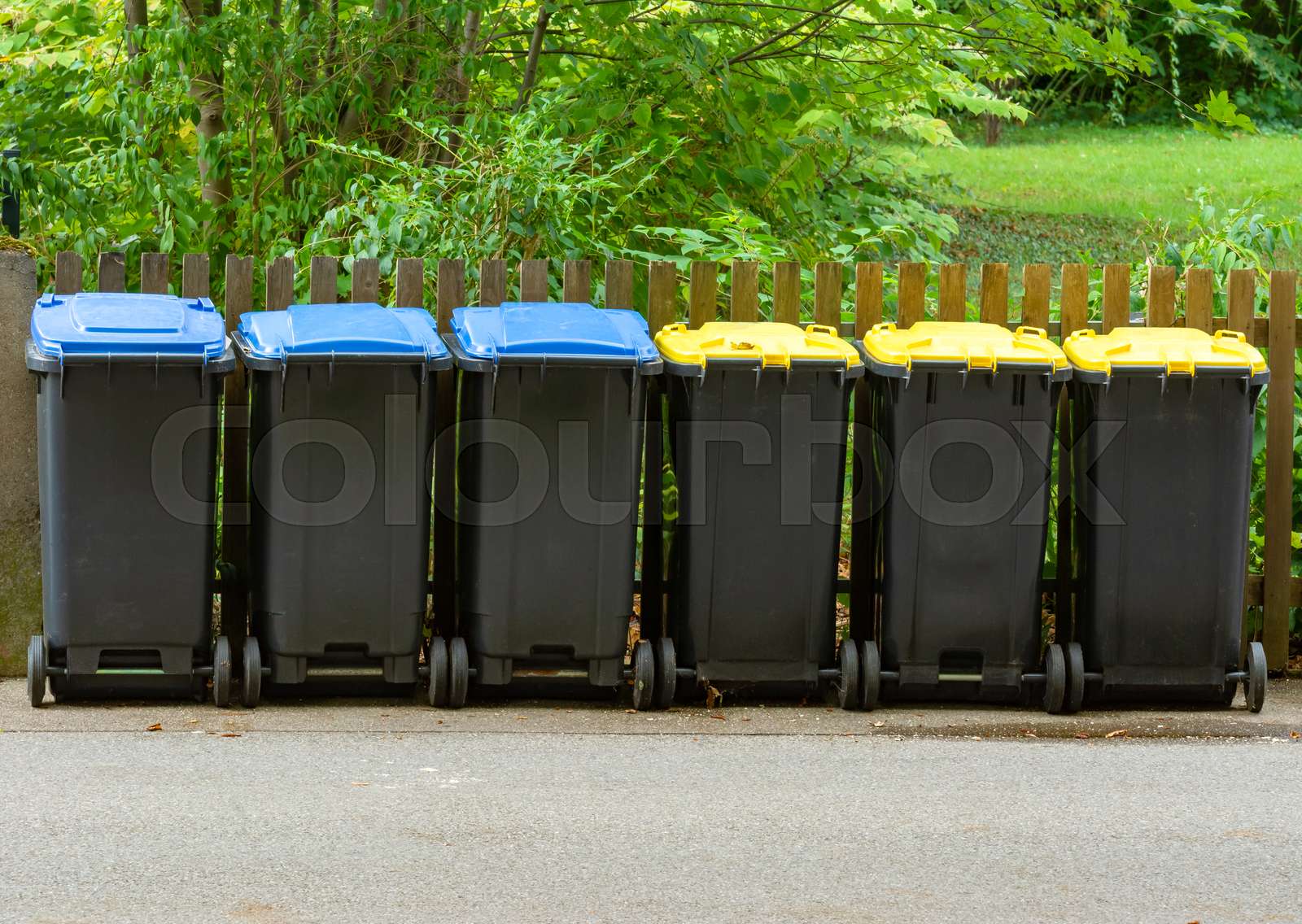 Row of garbage cans | Stock image | Colourbox
