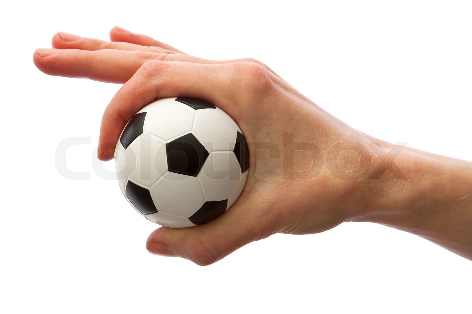 Soccer ball in hand | Stock image | Colourbox