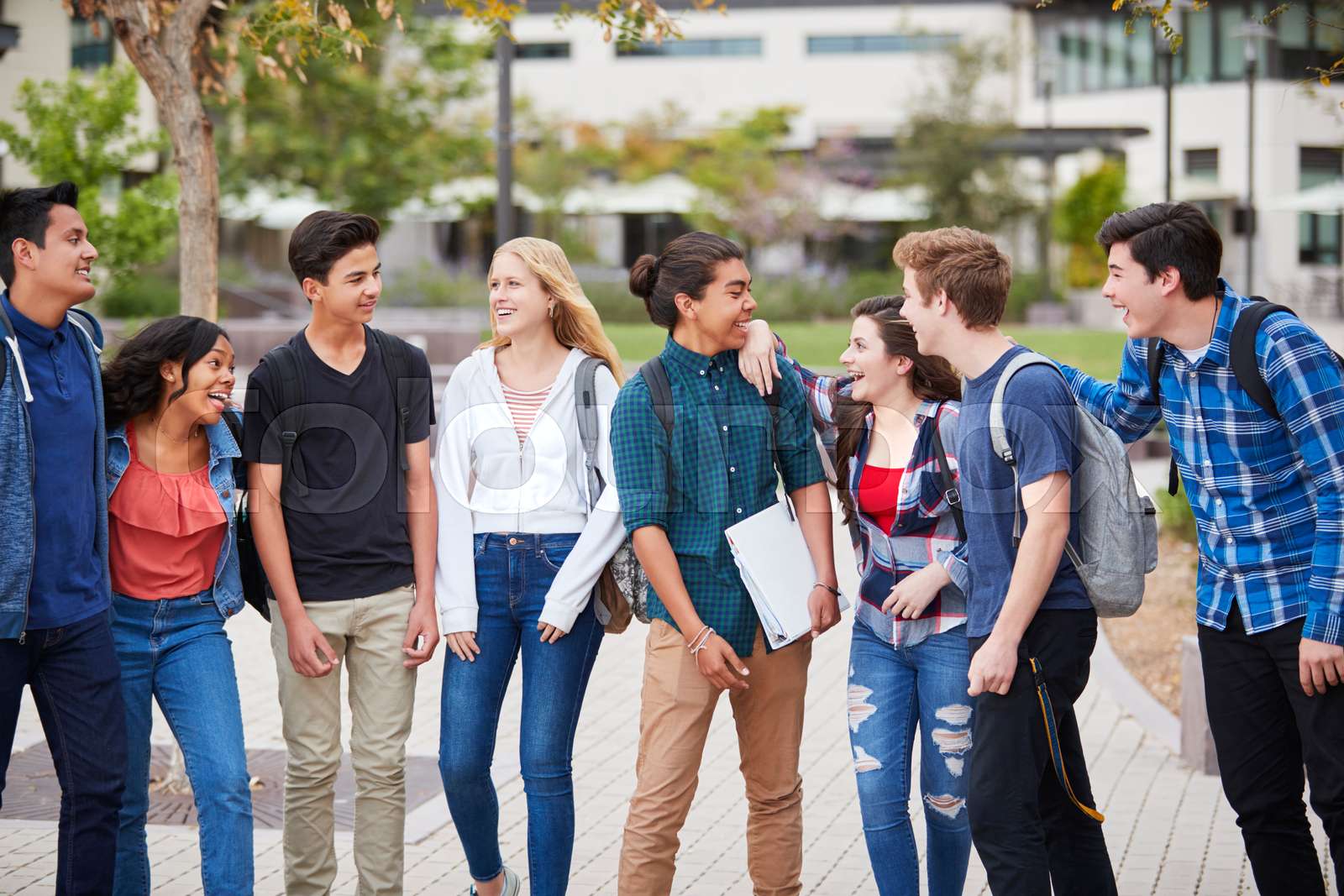 High School Students Socializing Outside College Buildings | Stock ...