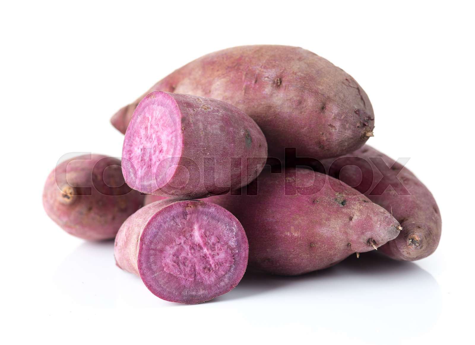 Fresh purple cassava isolated on white | Stock image | Colourbox