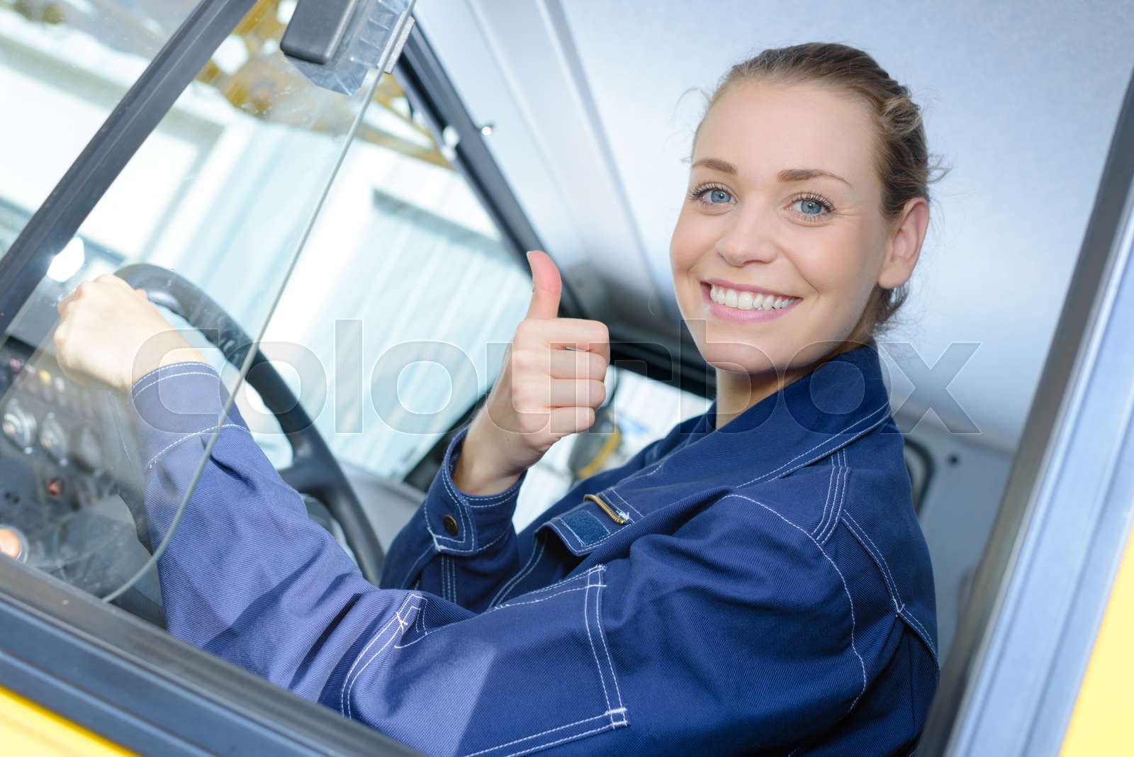 female heavy equipment operator | Stock image | Colourbox