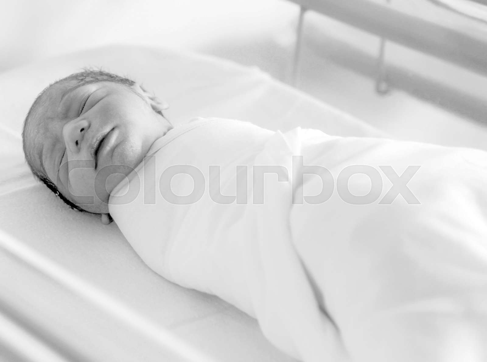 Newborn baby in hospital | Stock image | Colourbox