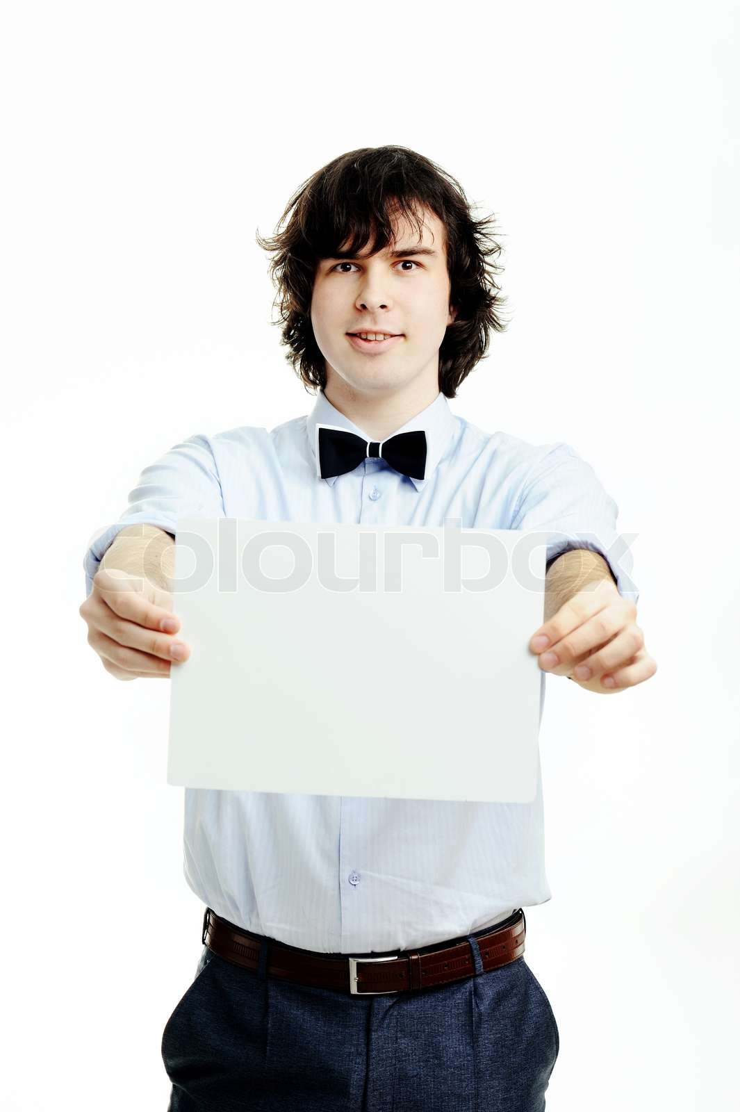 Man with sheet of paper | Stock image | Colourbox