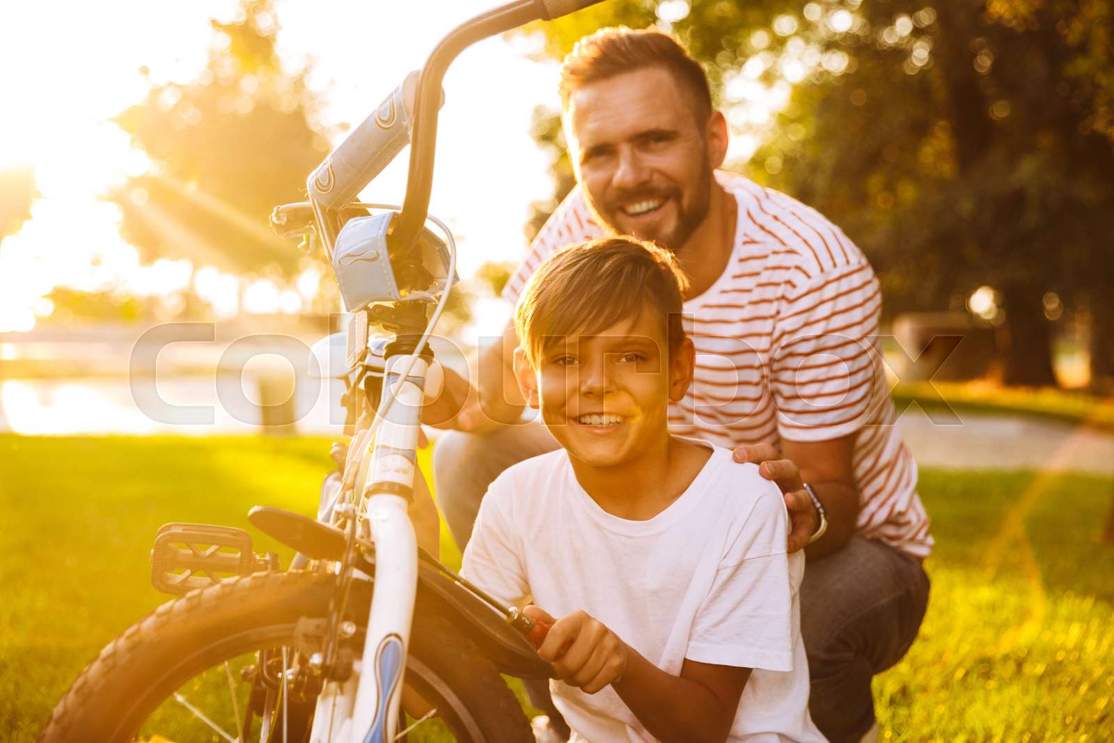 Joyful father and his son having fun | Stock image | Colourbox