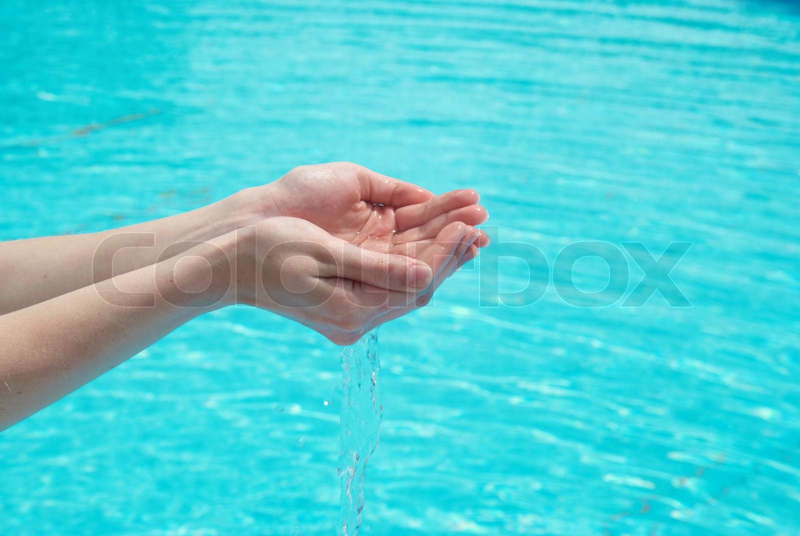 Human hands with water | Stock image | Colourbox