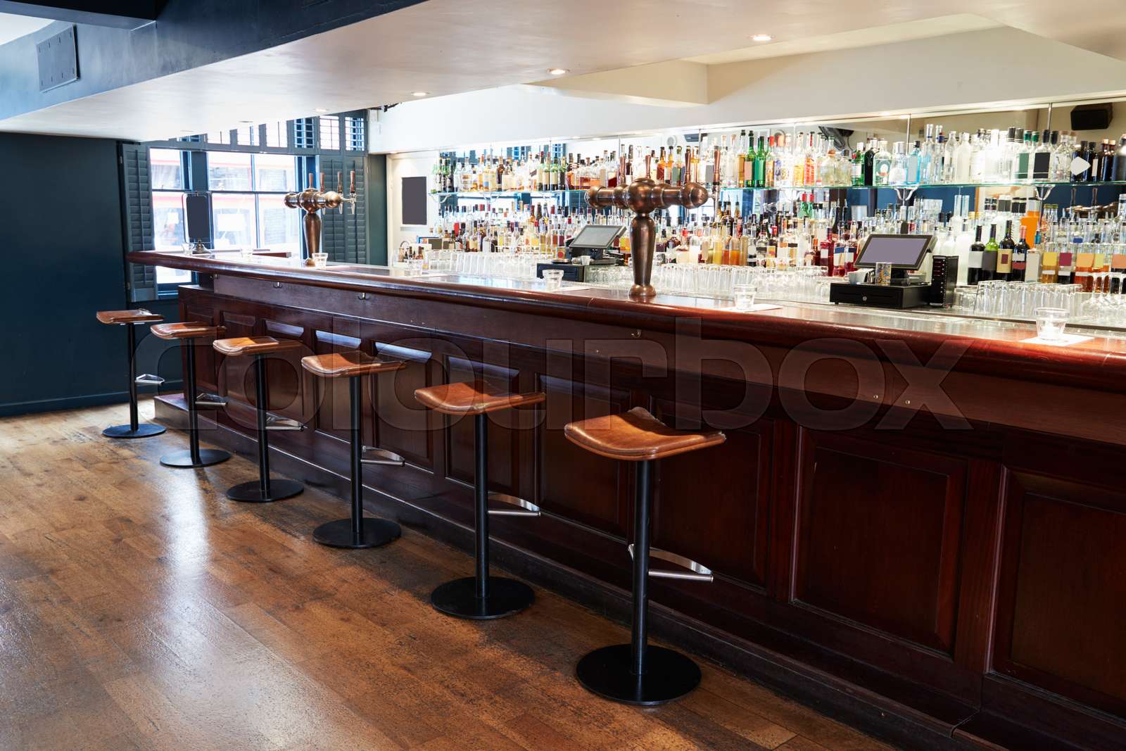 Interior Of Empty Bar With Stools And Counter | Stock image | Colourbox