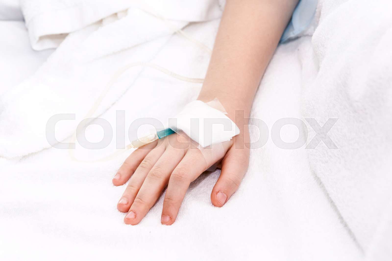 Little girl hand with IV saline intravenous in hospital | Stock image ...