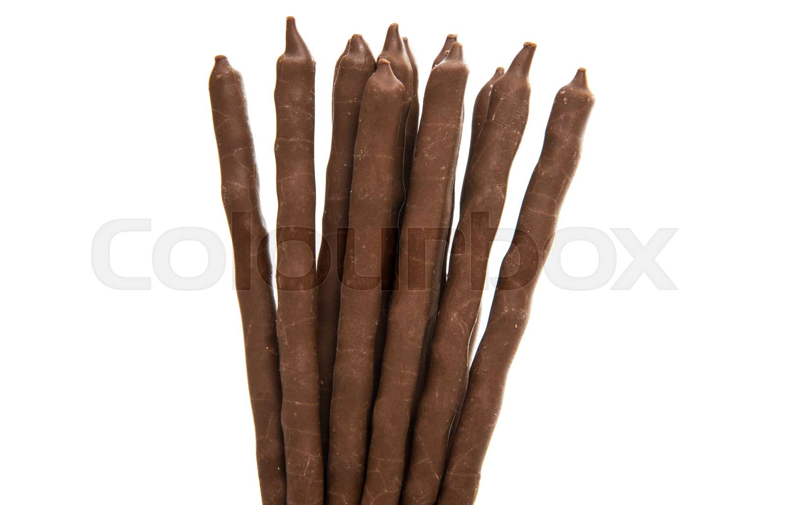 chocolate covered sticks isolated | Stock image | Colourbox