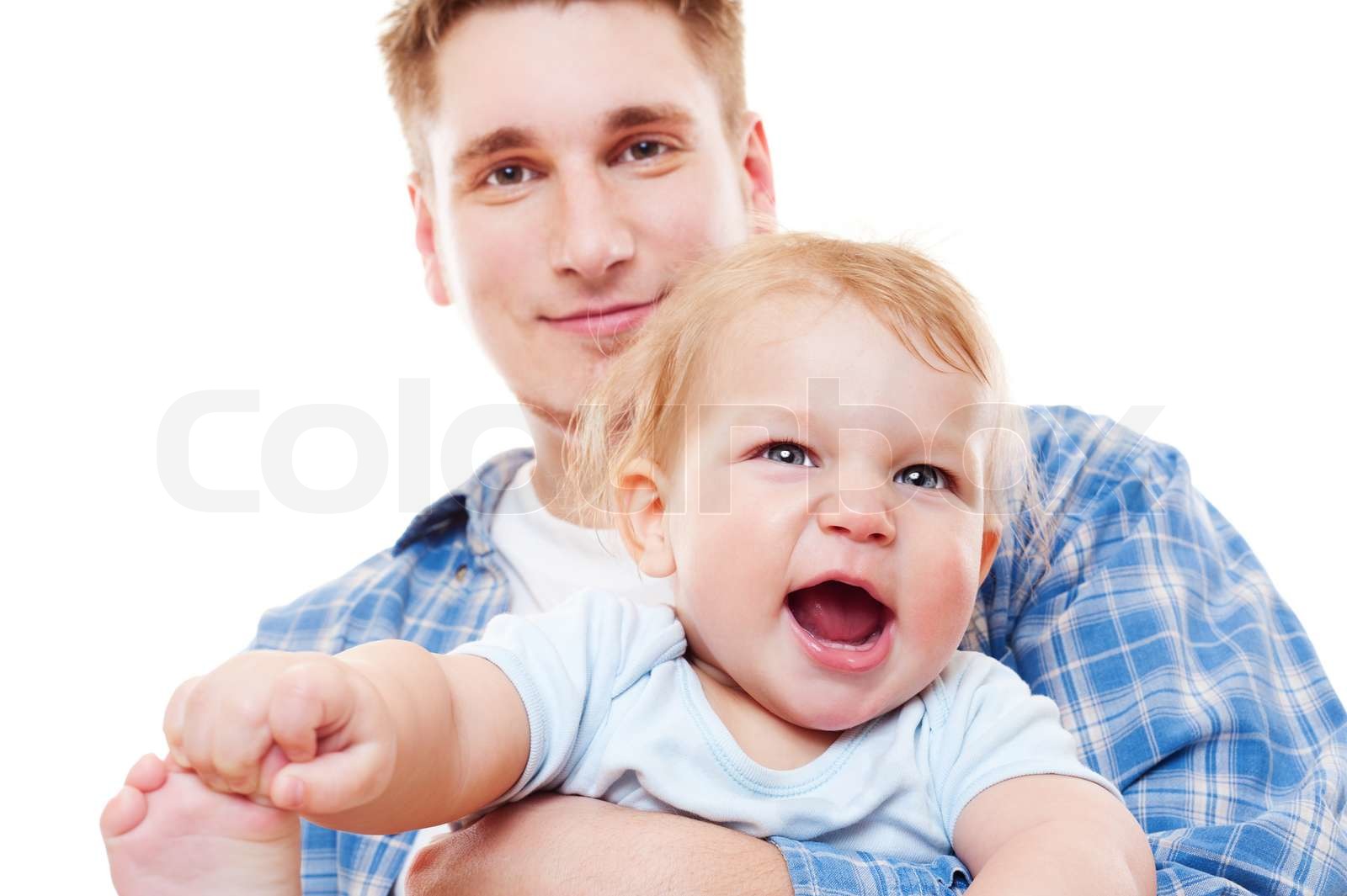 smiley mand bedrift griner baby dreng | Stock foto | Colourbox