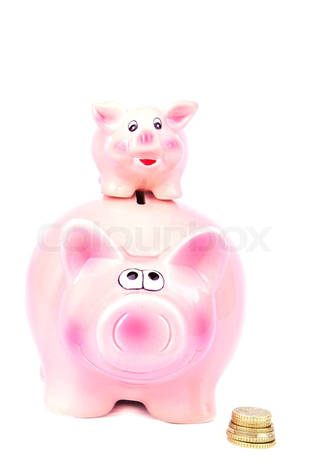 Ekstra penge - Piggy Bank på en hvid baggrund | Stock foto | Colourbox