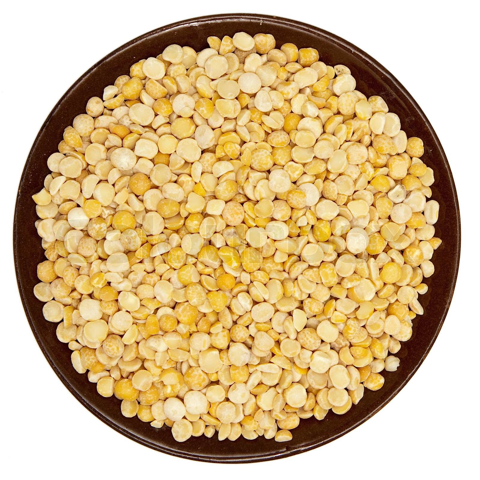 Peas in a brown plate isolated | Stock image | Colourbox