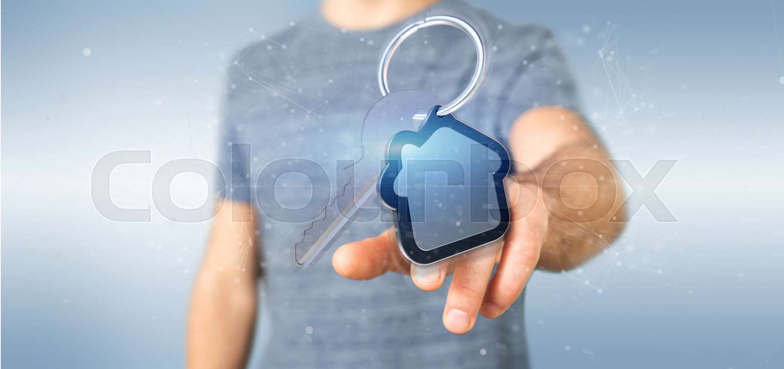 Man holding a Key and house 3d rendering | Stock image | Colourbox
