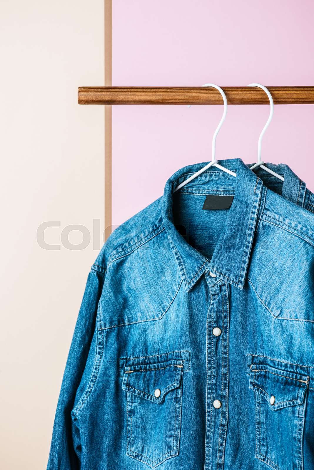 casual denim shirts on hangers, fashion industry | Stock image | Colourbox