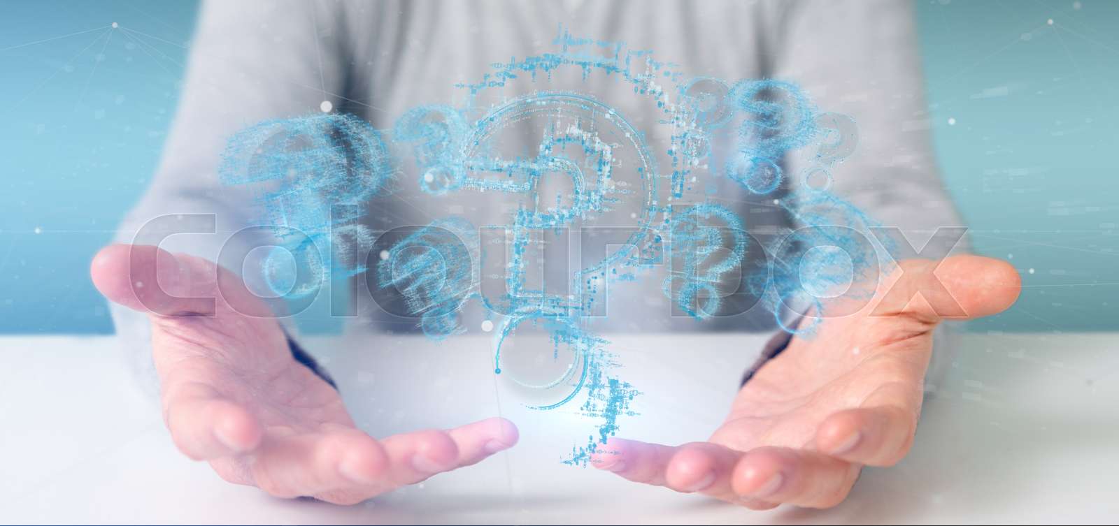 Man holding a Question mark | Stock image | Colourbox