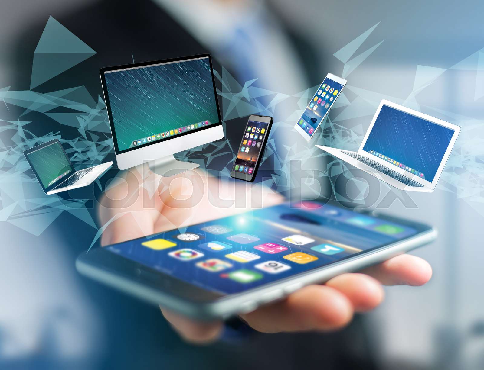 Computer and devices displayed on a futuristic interface - Multimedia ...