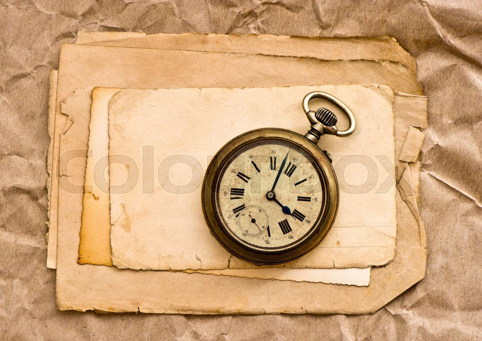 Old paper sheets vintage pocket clock | Stock image | Colourbox