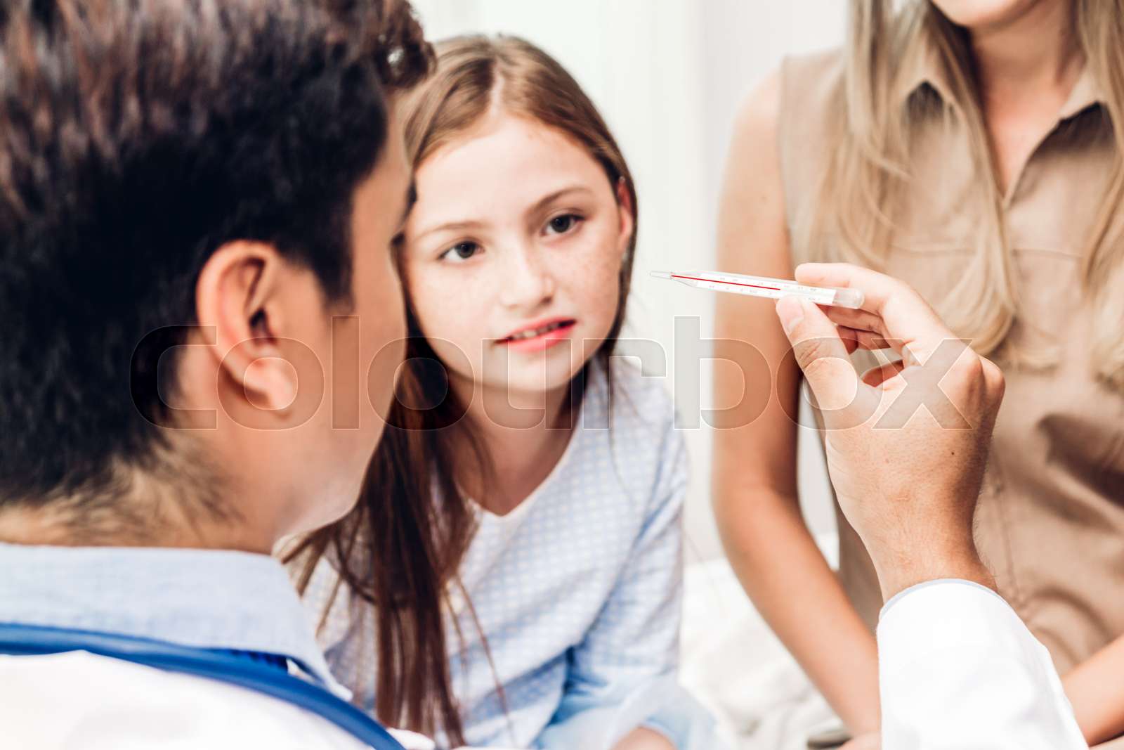 doctor-holding-thermometer-and-checking-ill-little-girl-sick-little